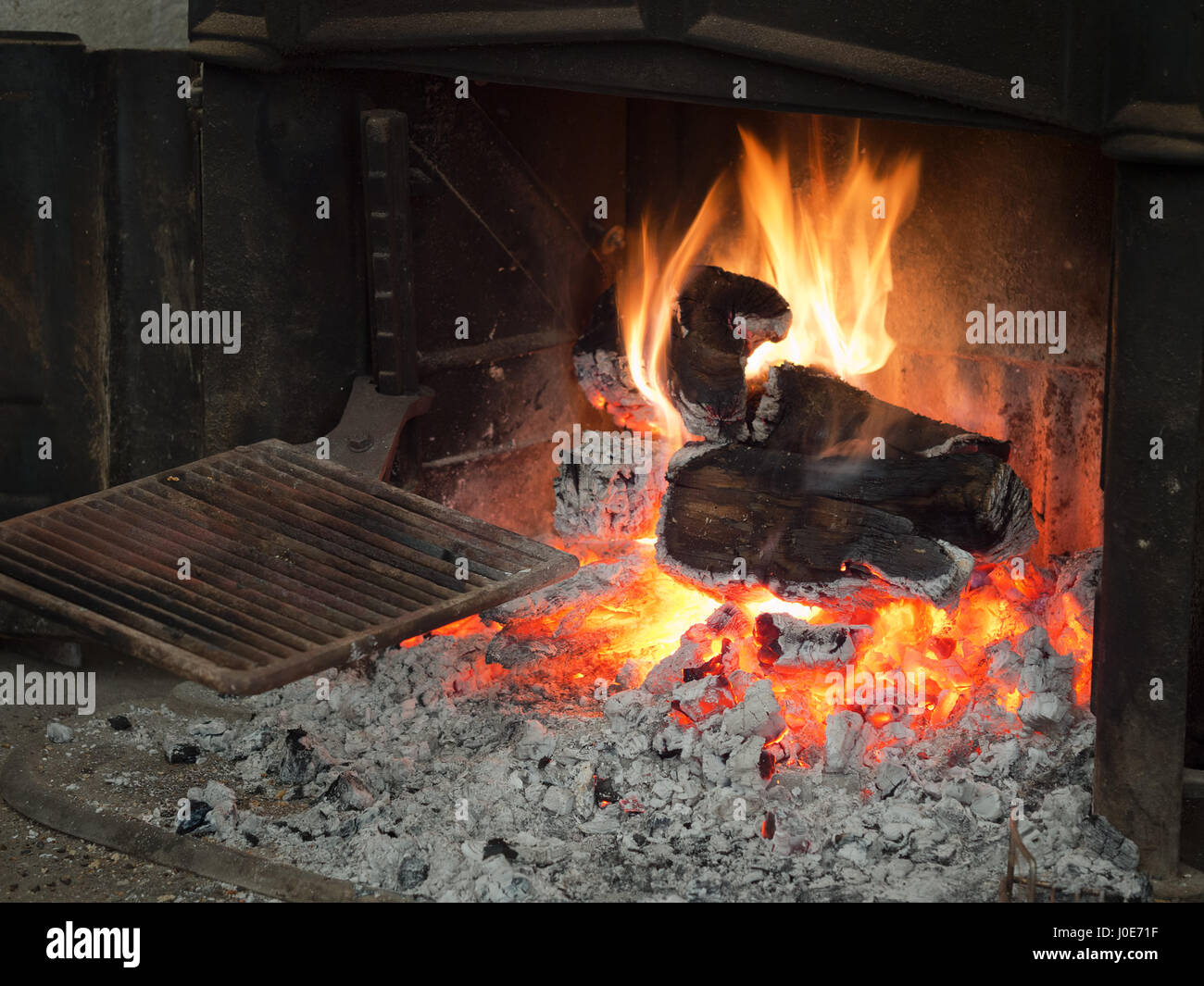 Open cooking fire, indoors Stock Photo - Alamy