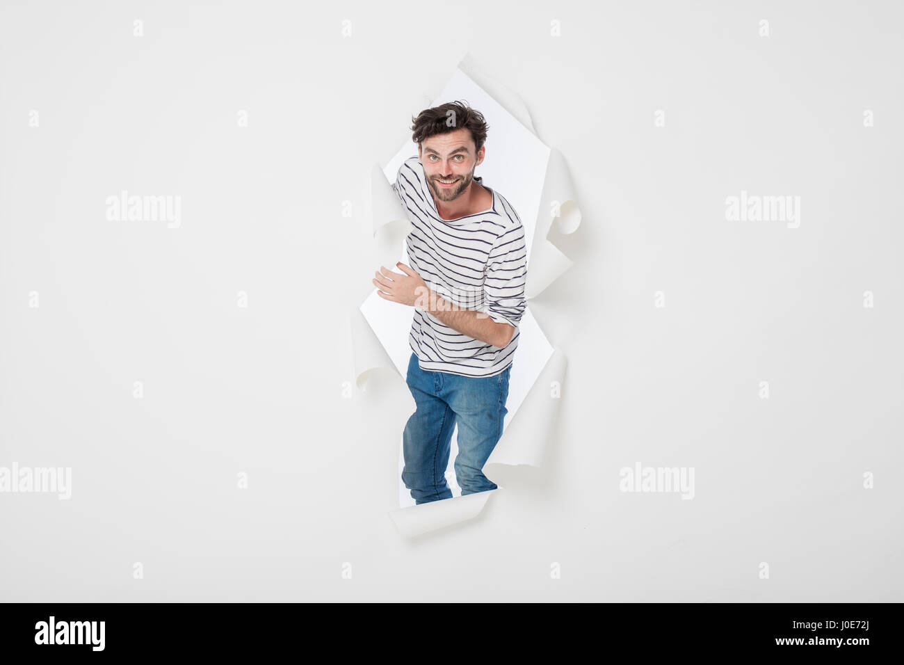 Businessman breaking wall business concept hi-res stock photography and ...
