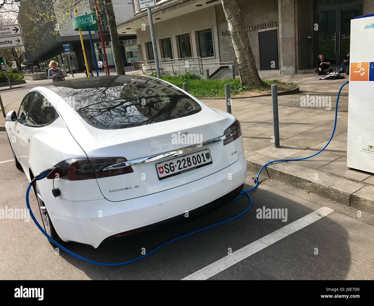 Tesla Model S being charged Stock Photo - Alamy