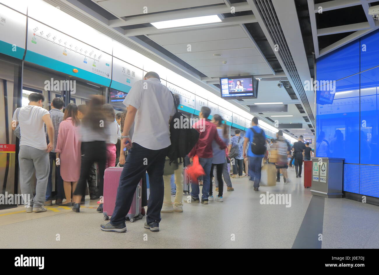 People commute by subway in Guangzhou downtown China Stock Photo - Alamy