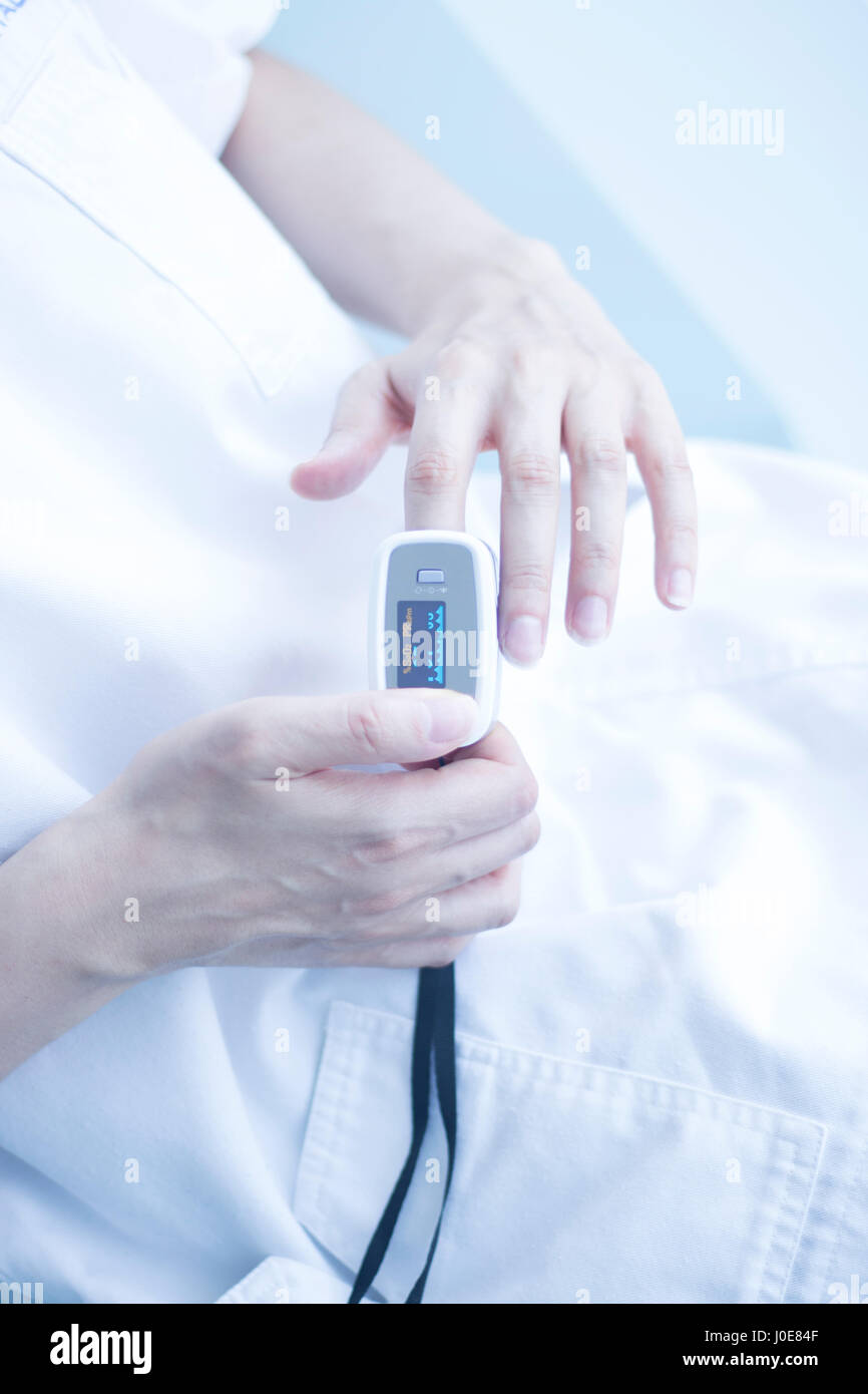 Blood pressure finger resting pulse monitor used to take heart rate and ...