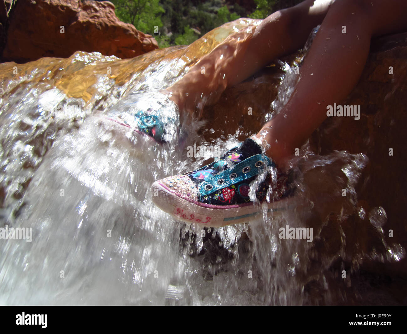 Child feet in water hi-res stock photography and images - Alamy