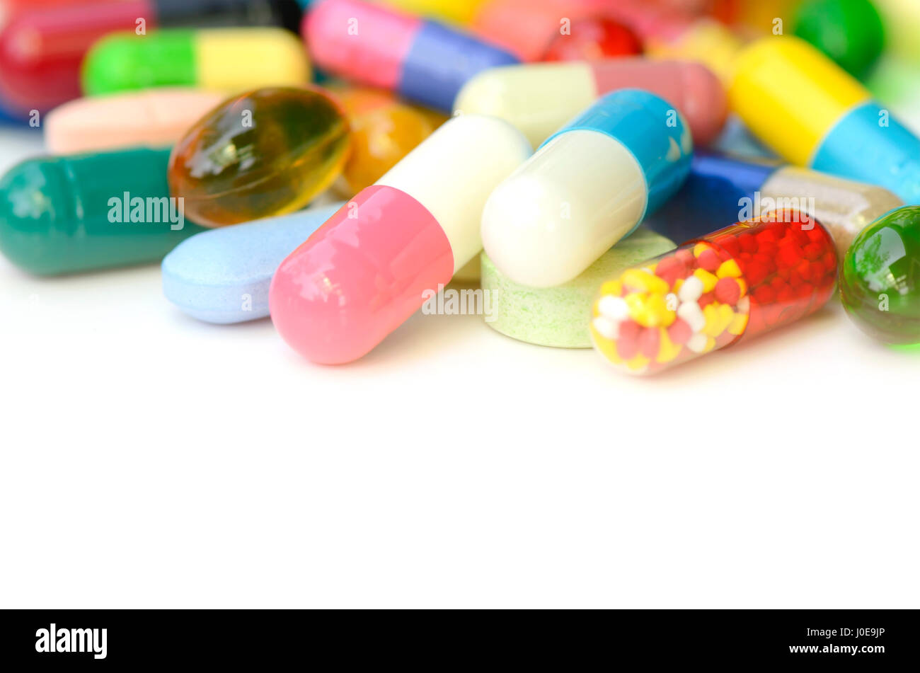 Colorful of oral medications on White Background Stock Photo - Alamy