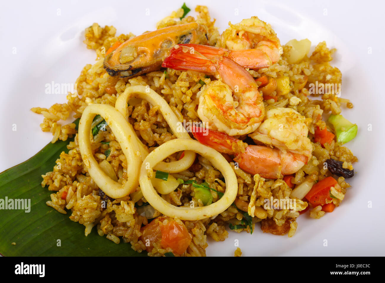 Fried rice with seafood - shrimp, mussel, squid Stock Photo - Alamy