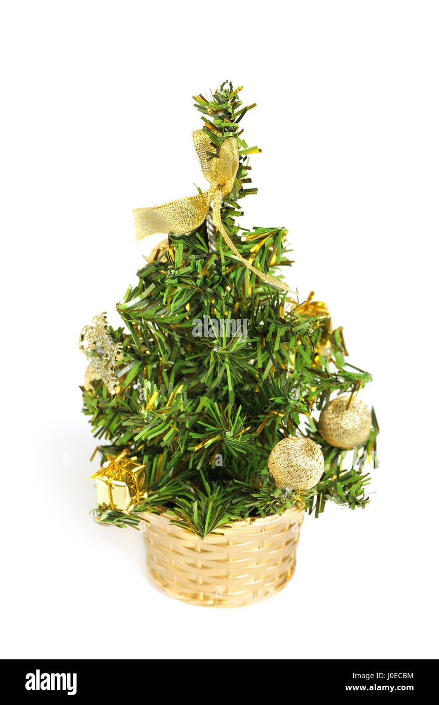 Small christmas tree isolated on white background Stock Photo - Alamy