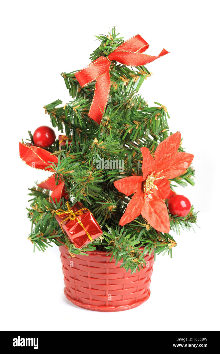 Small christmas tree isolated on white background Stock Photo - Alamy