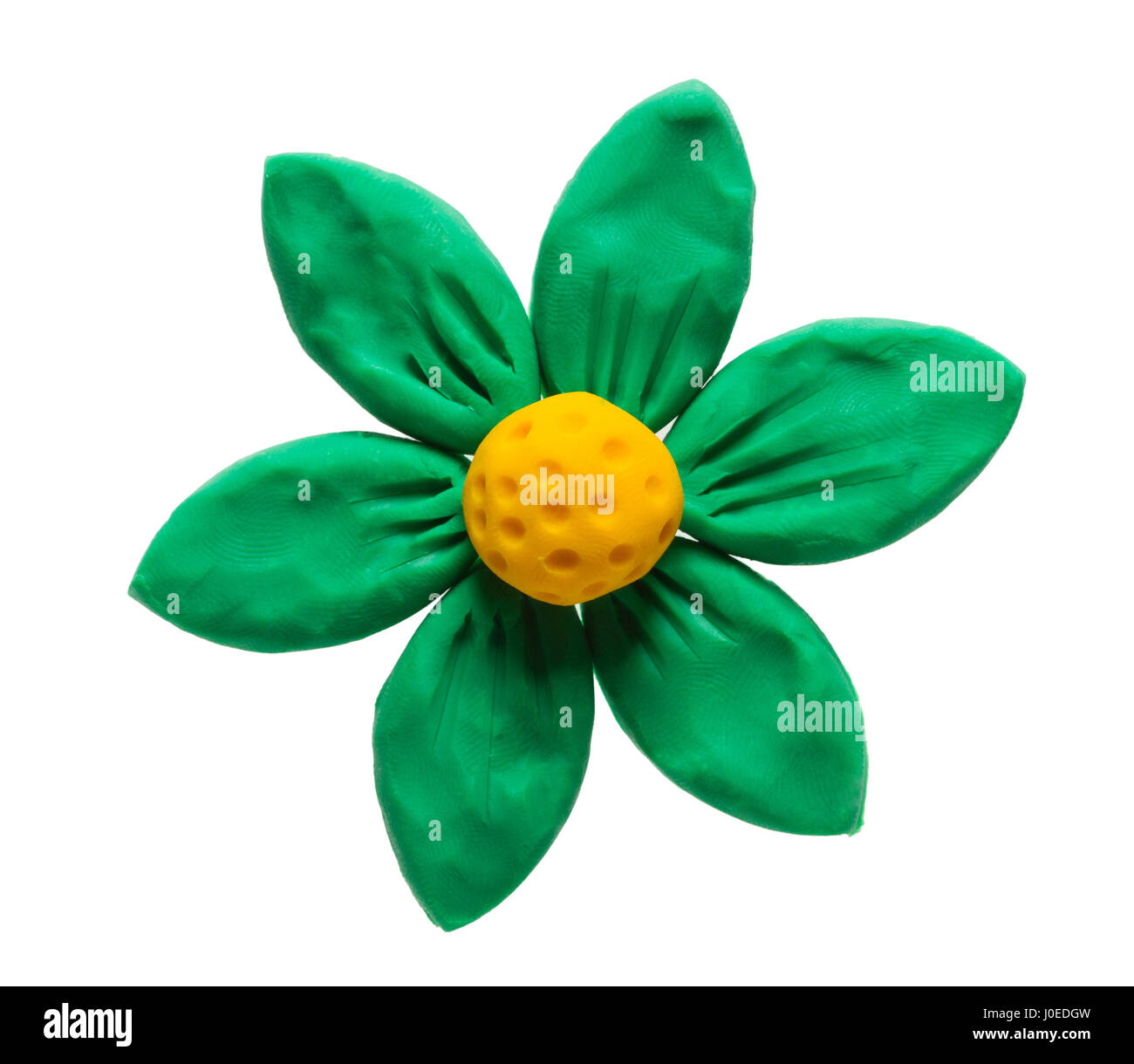 Green plasticine flower isolated on white background Stock Photo - Alamy