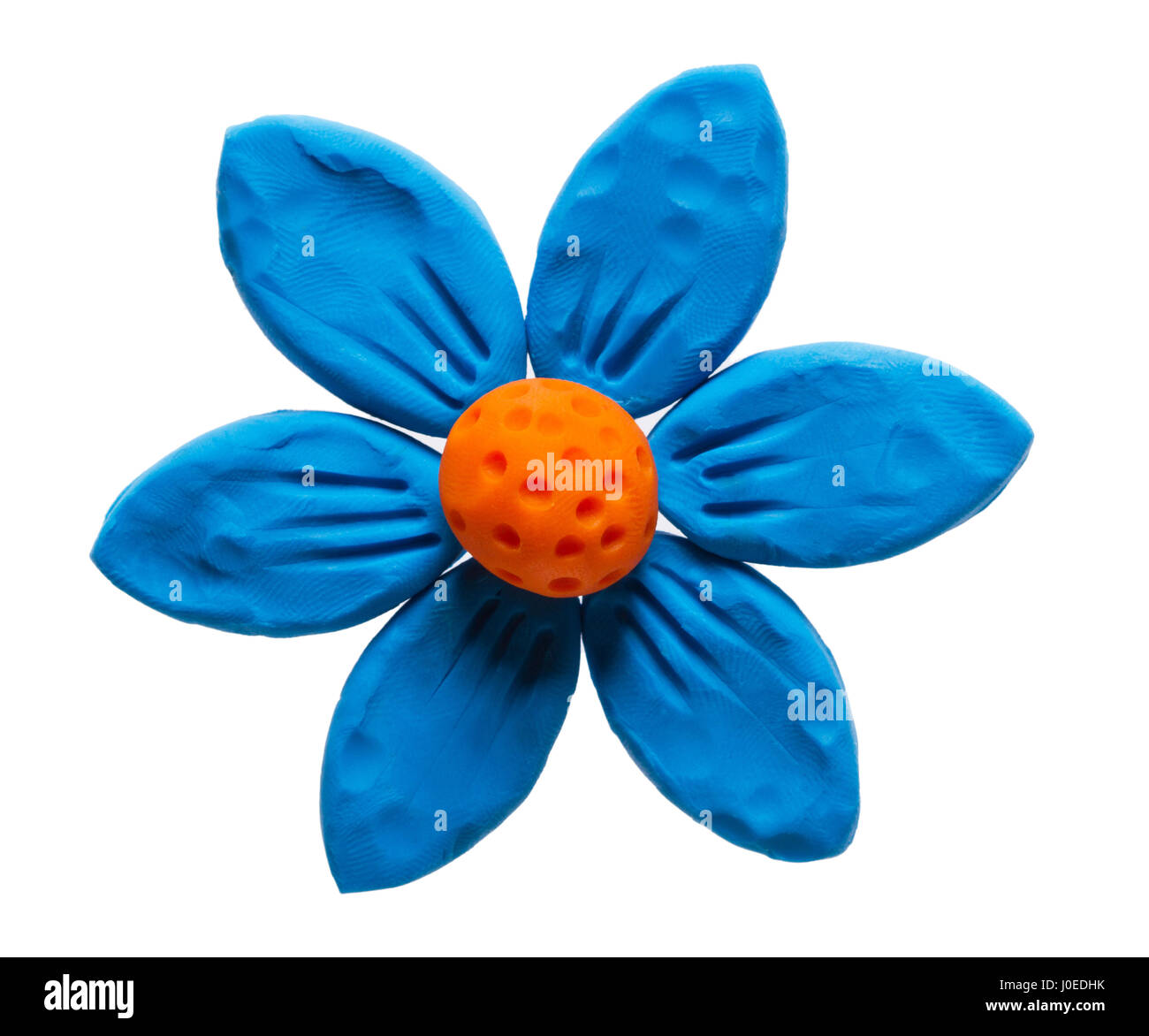 Blue plasticine flower isolated on white background Stock Photo - Alamy