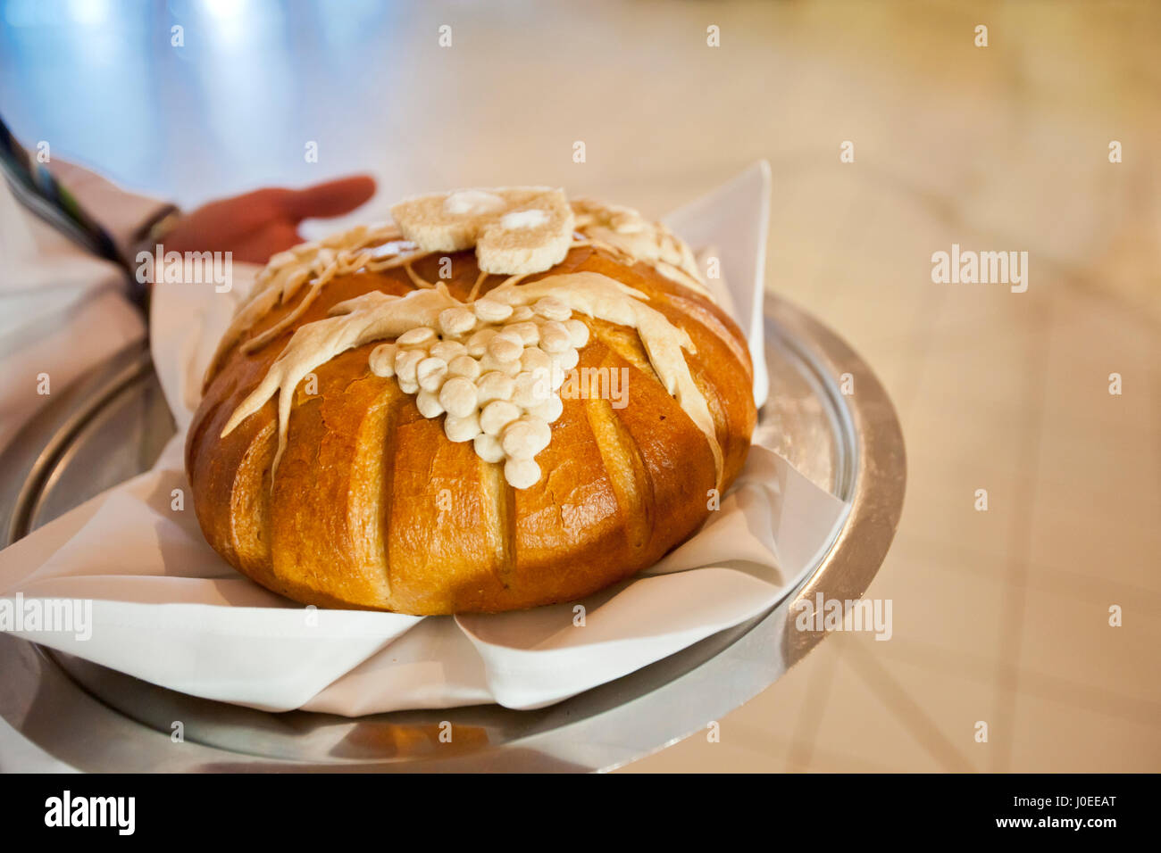 Wedding bread with salt detail on hands- traditional polish inviting to ...