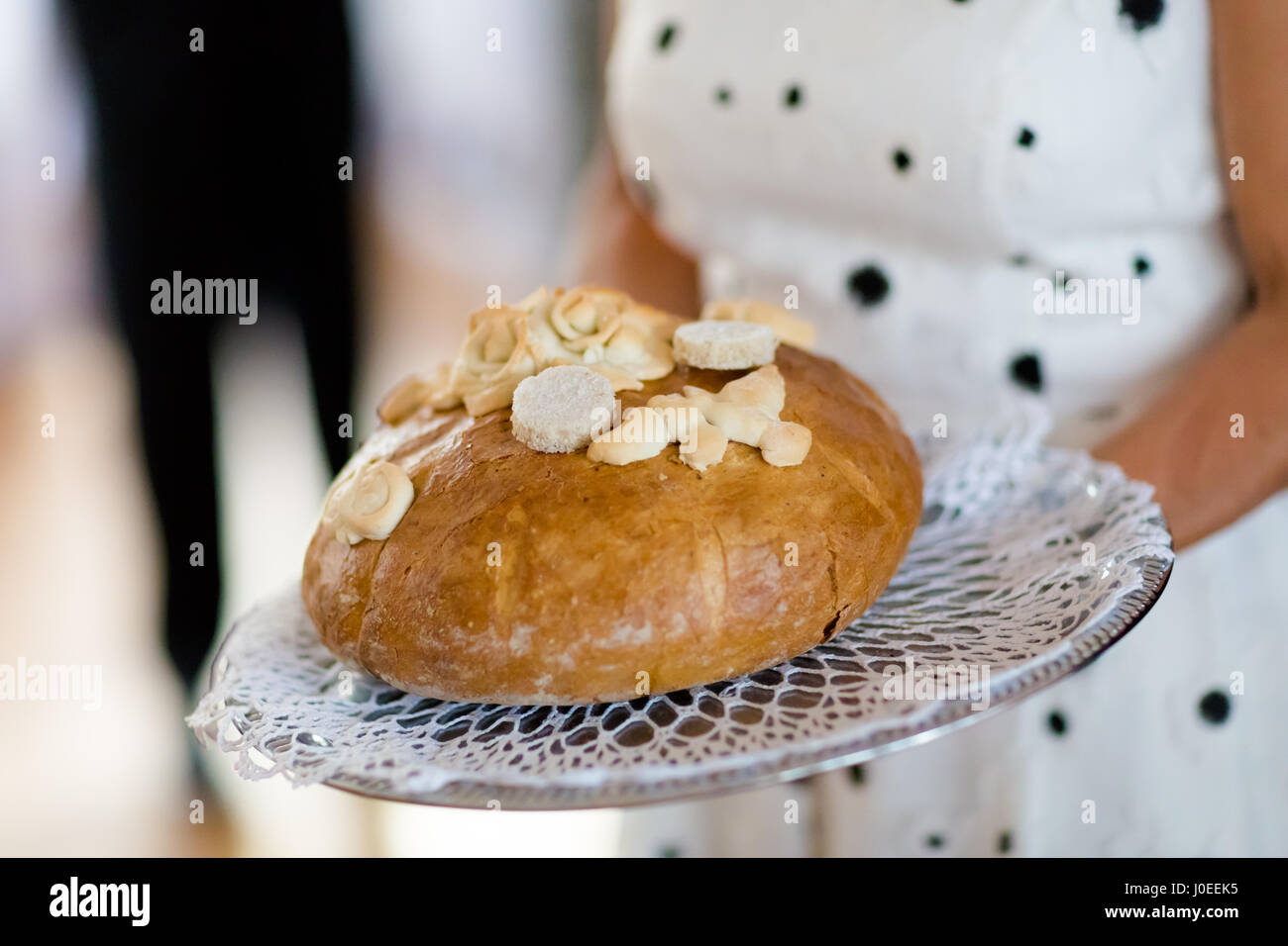 Wedding bread with salt detail on hands- traditional polish inviting to ...
