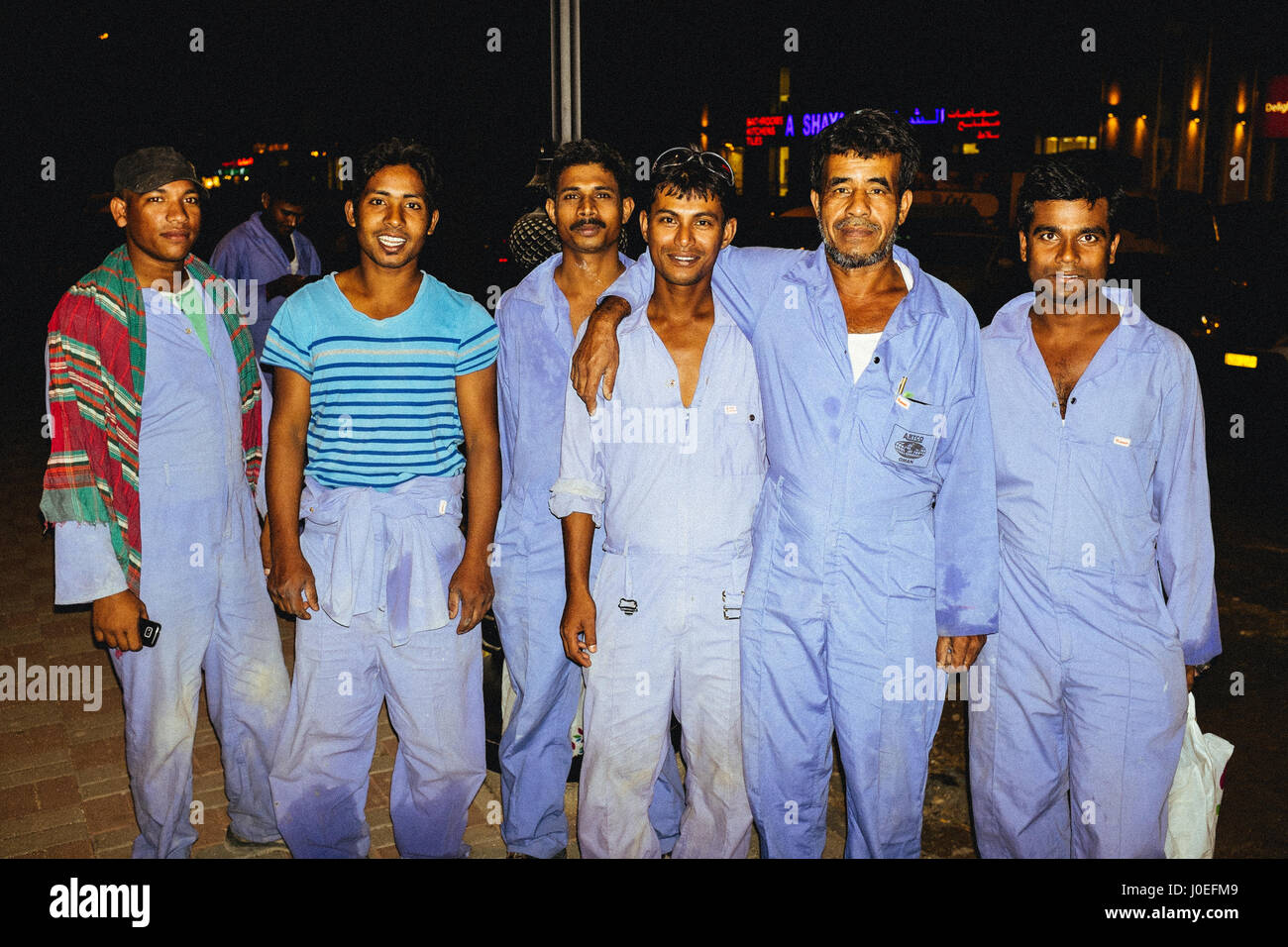 Some workers pictured in Muscat, Oman Stock Photo - Alamy