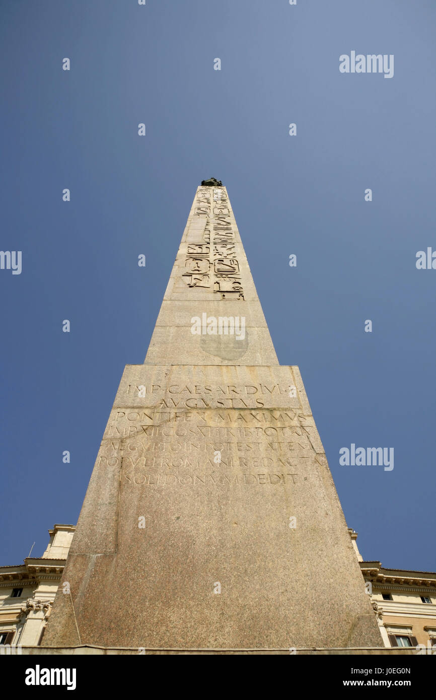 Roman obelisk in front of the Montecitorio Palace parliament building ...