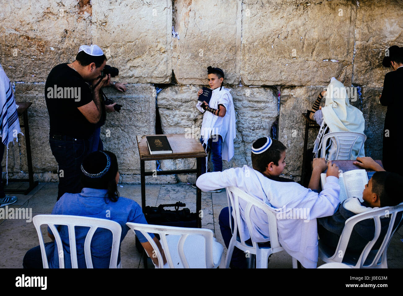 Jews in all ages make pilgrimage to the Wailing Wall in Jerusalem. Here ...