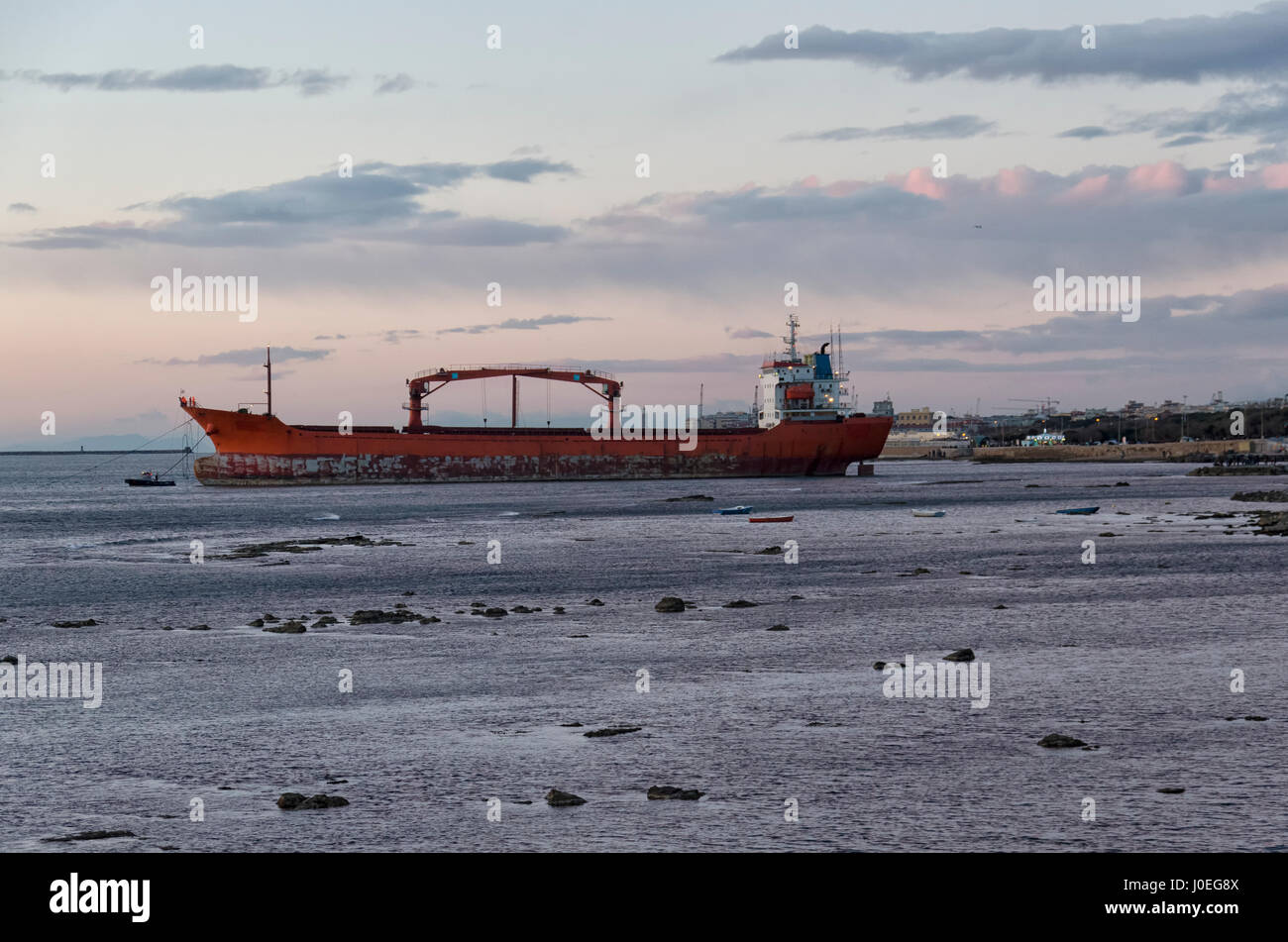 View of cargo ship aground off the coast Stock Photo - Alamy