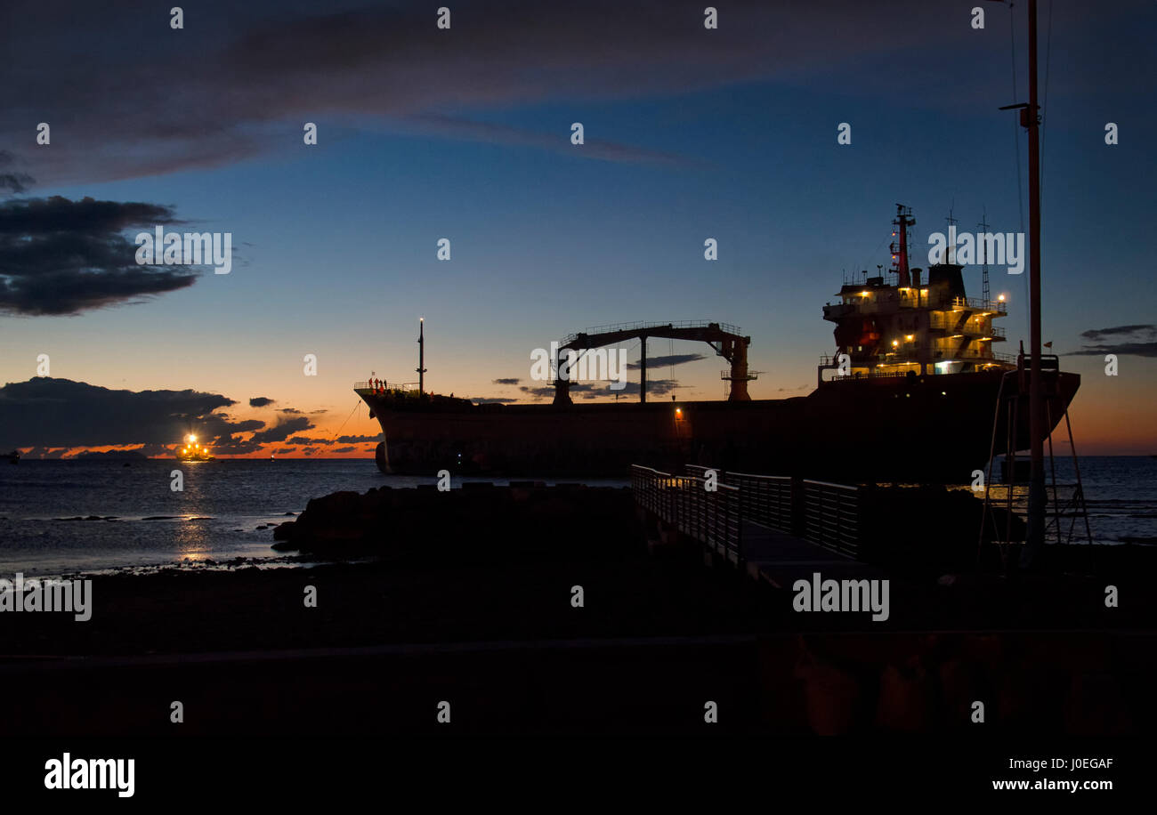 View of ship aground off the coast Stock Photo - Alamy