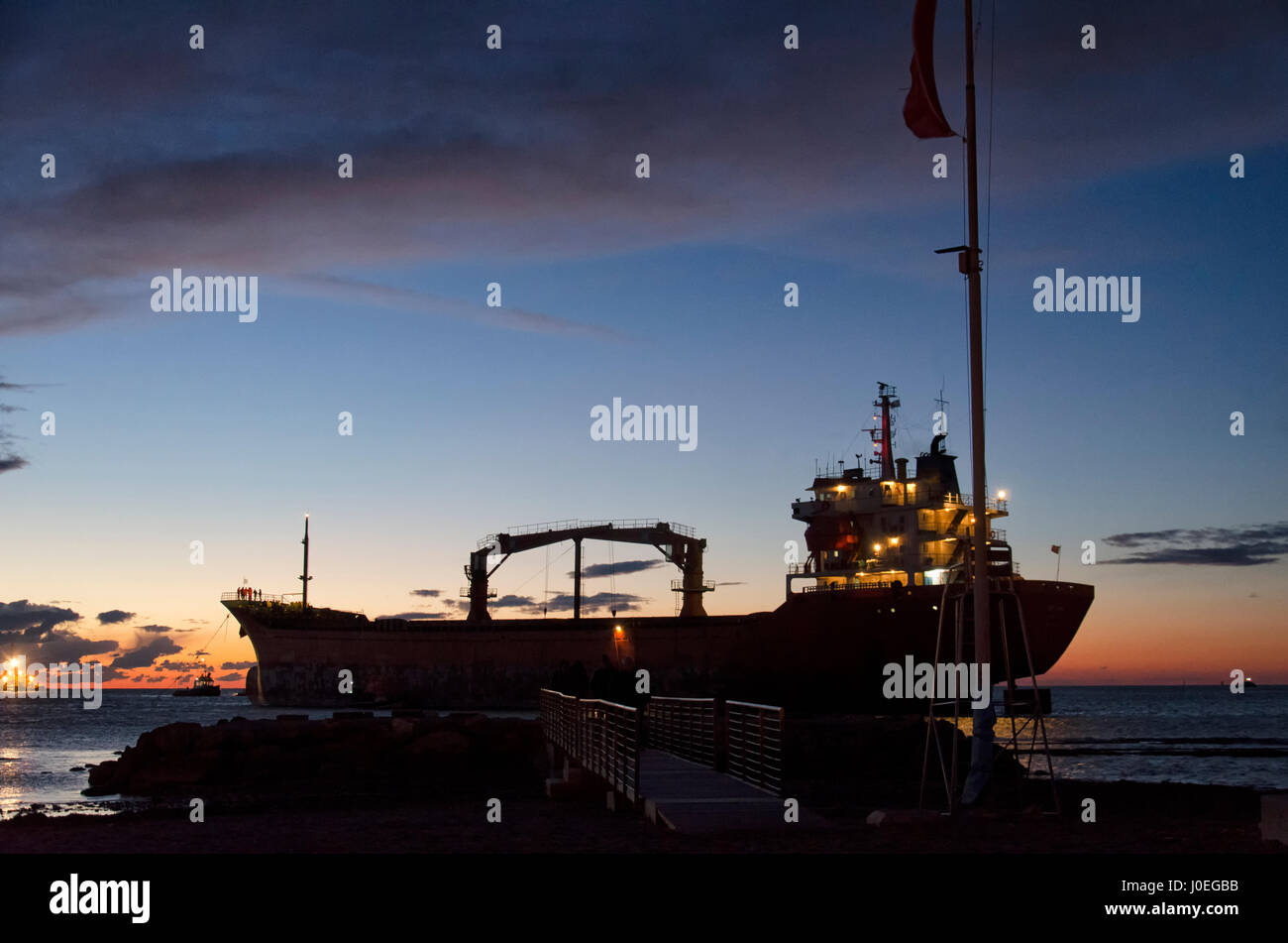 View of cargo ship beached near the coast Stock Photo - Alamy