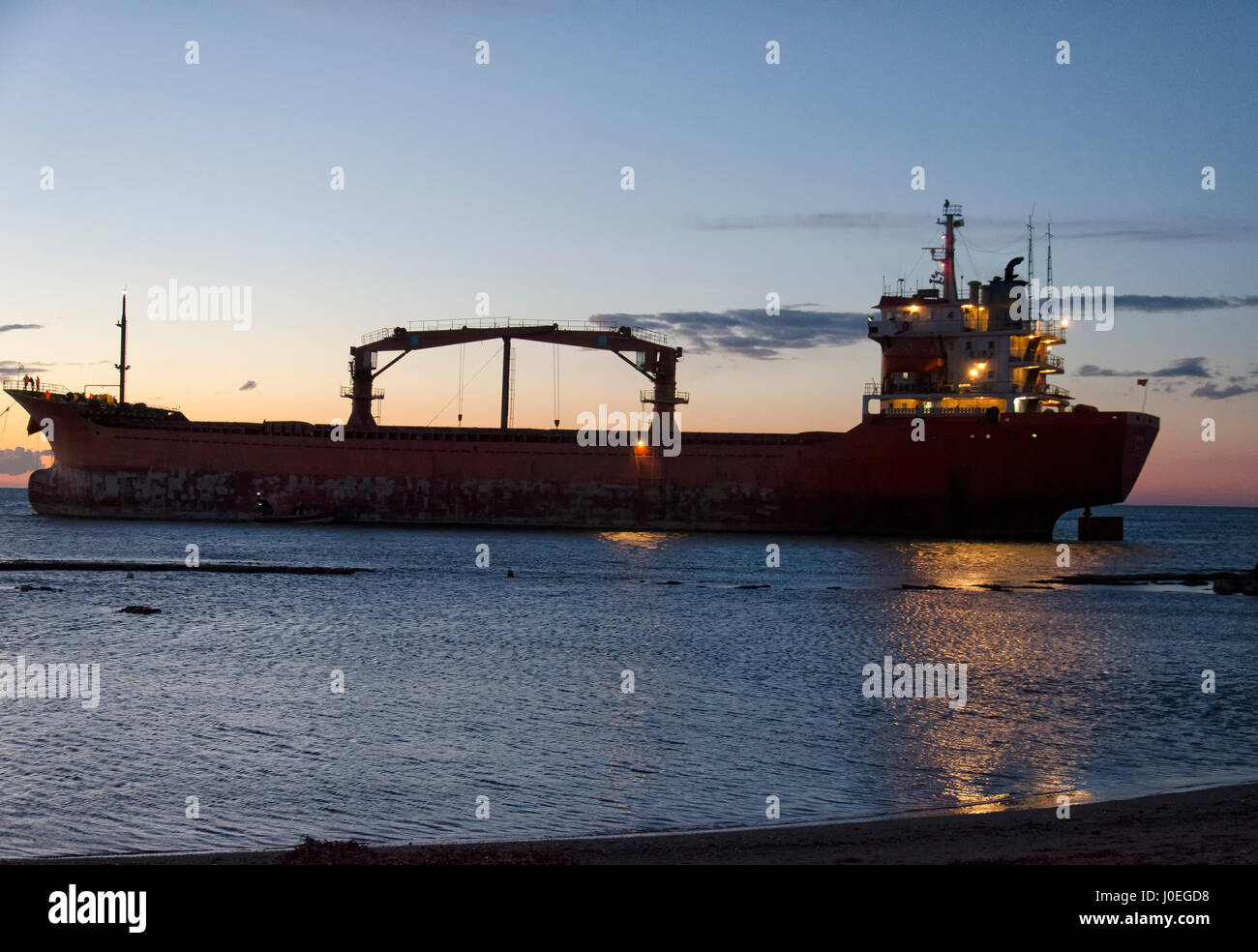 The rescue operations of an aground cargo ship Stock Photo - Alamy