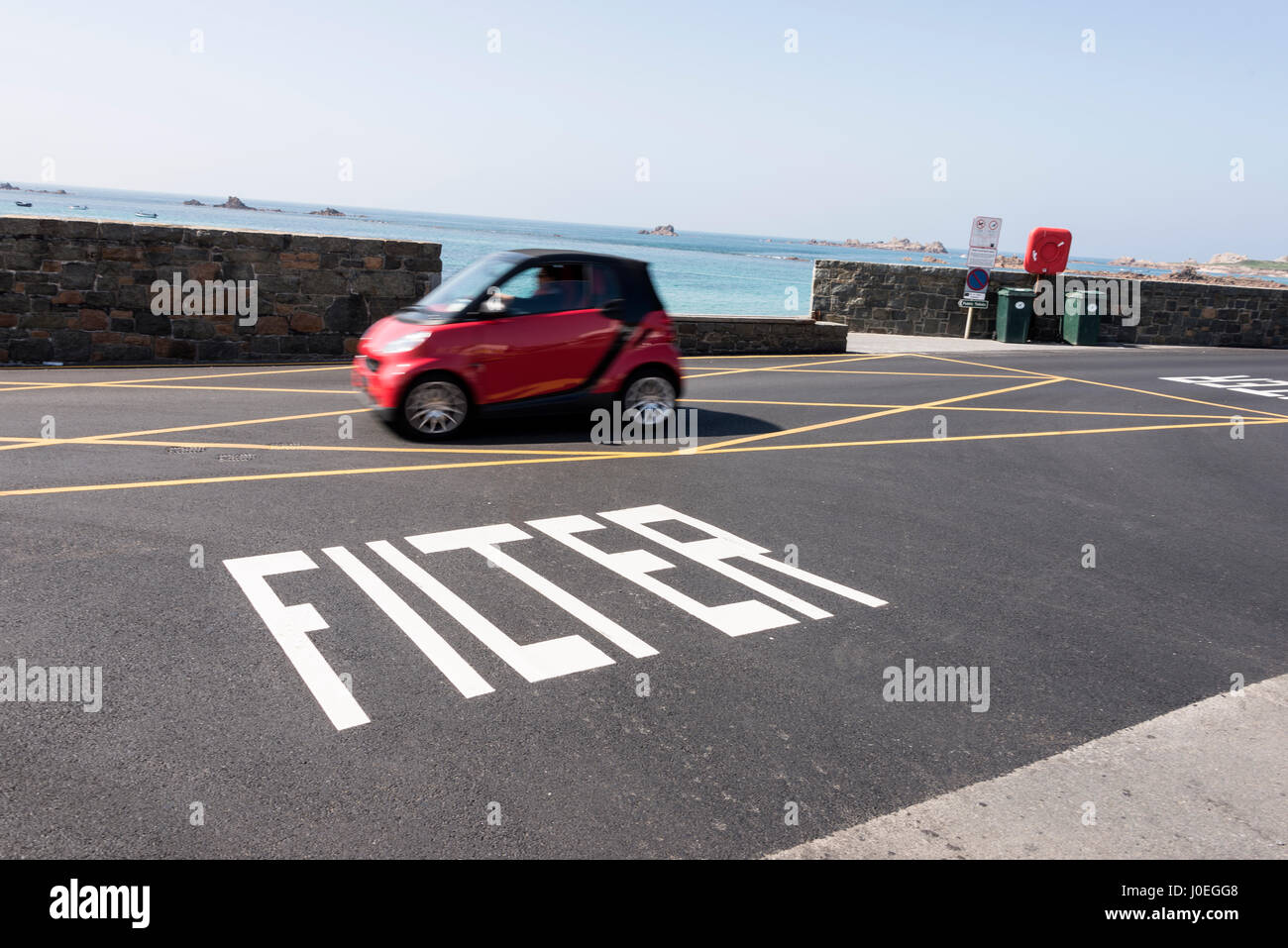A car passes over the painted yellow squares seen at main junctions ...