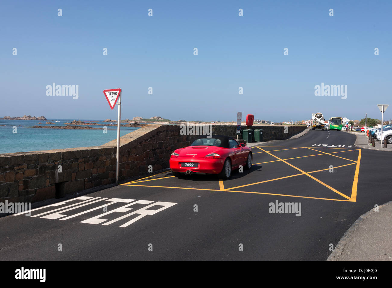 A car passes over the painted yellow squares seen at main junctions ...