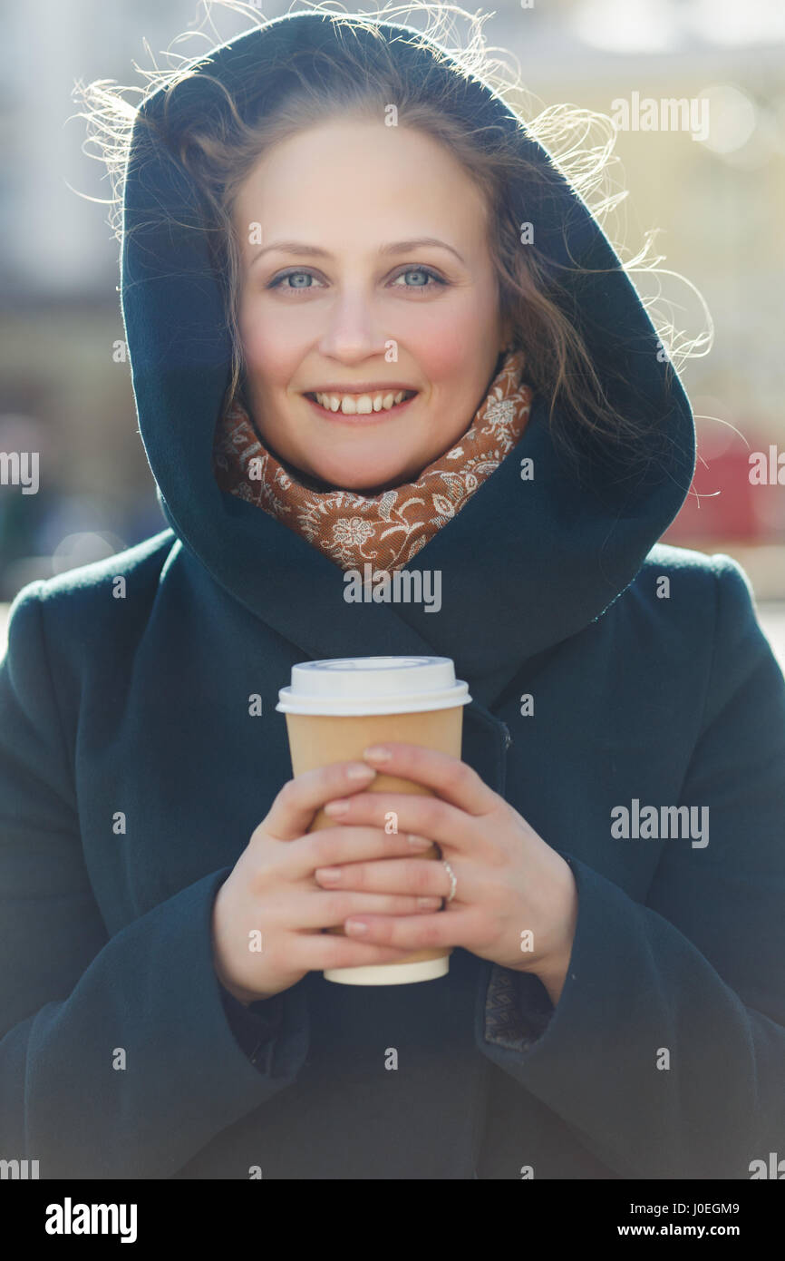 Beautiful model with coffee close-up Stock Photo - Alamy