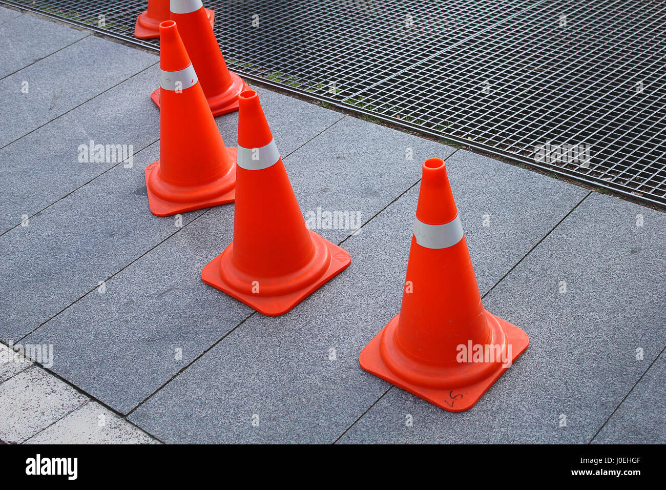 some traffic cone road signs in the street Stock Photo - Alamy