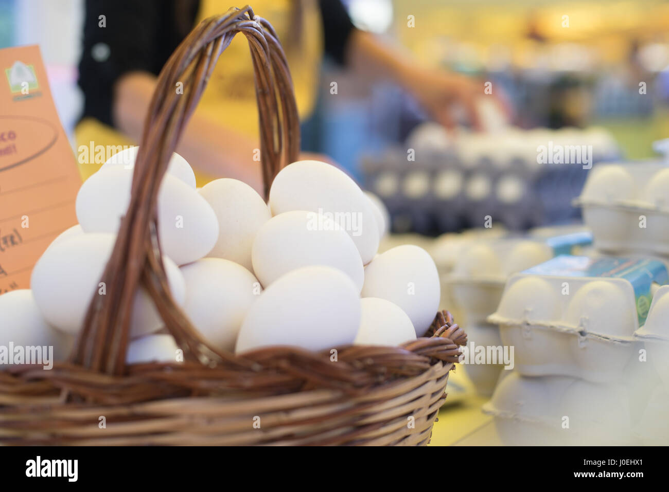 Many white fresh goose eggs in a basket at local open air market Stock ...