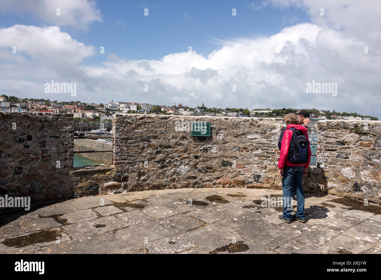A couple of visitors exploring Castle Cornet at St. Peter Port in ...