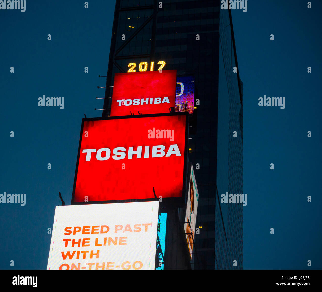 The Toshiba sign illuminates from One Times Square in New York on ...