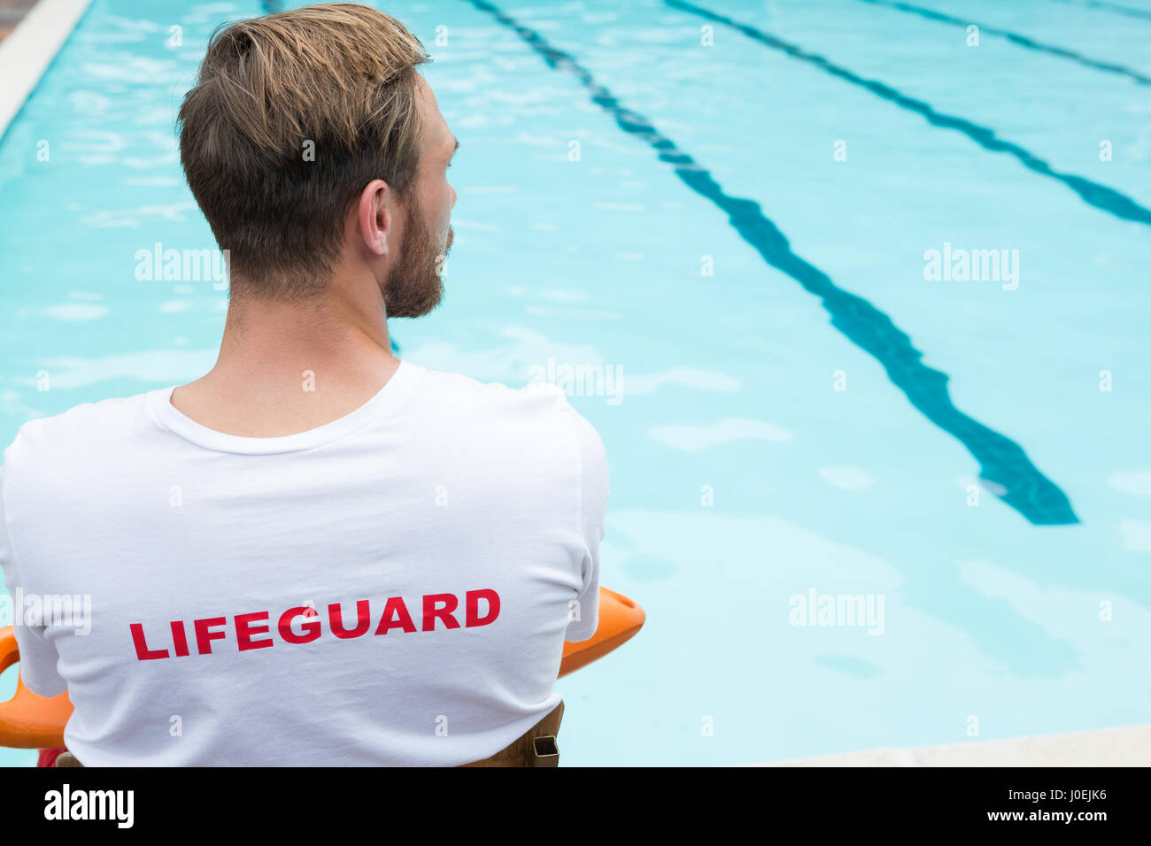 Security guard sitting on chair hi-res stock photography and images - Alamy
