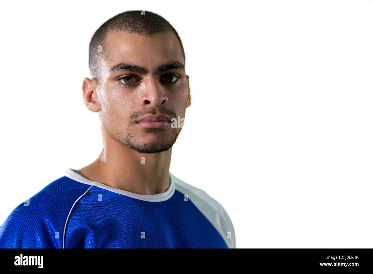 Young male footballer standing hi-res stock photography and images - Alamy