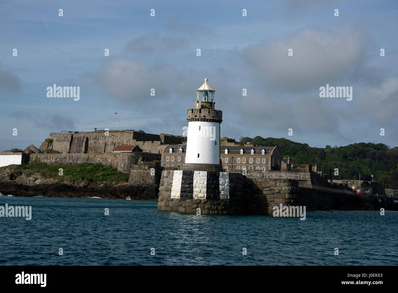 The 800 yearly Castle Cornet and the harbour light beacon at the ...