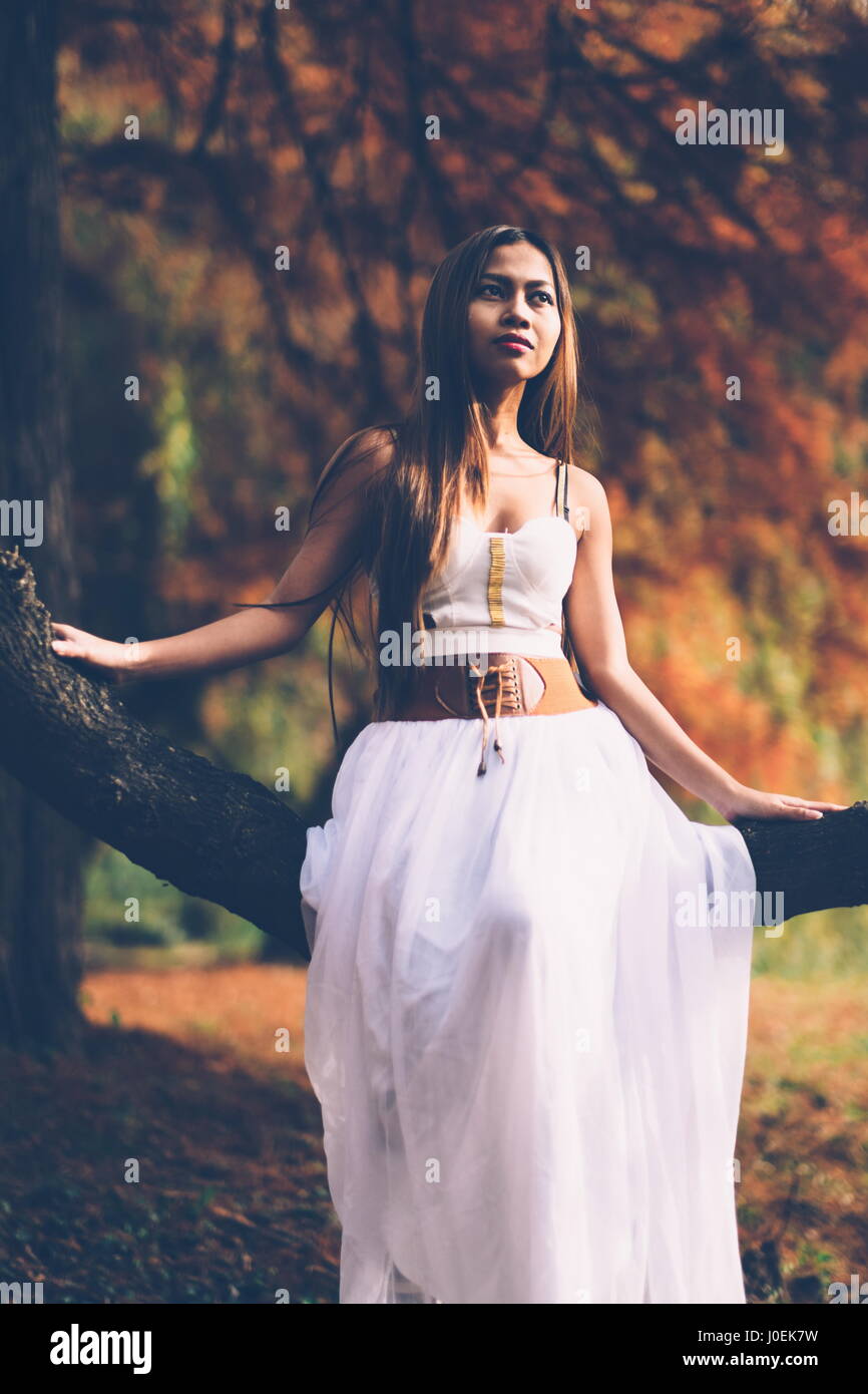 Portrait of beautiful wiccan girl in the forest Stock Photo - Alamy