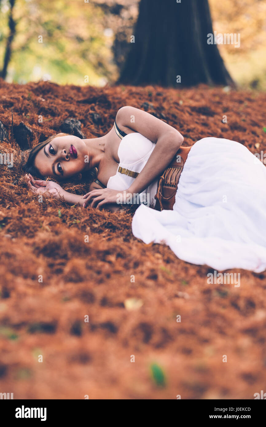 Portrait of beautiful wiccan girl in the forest Stock Photo - Alamy