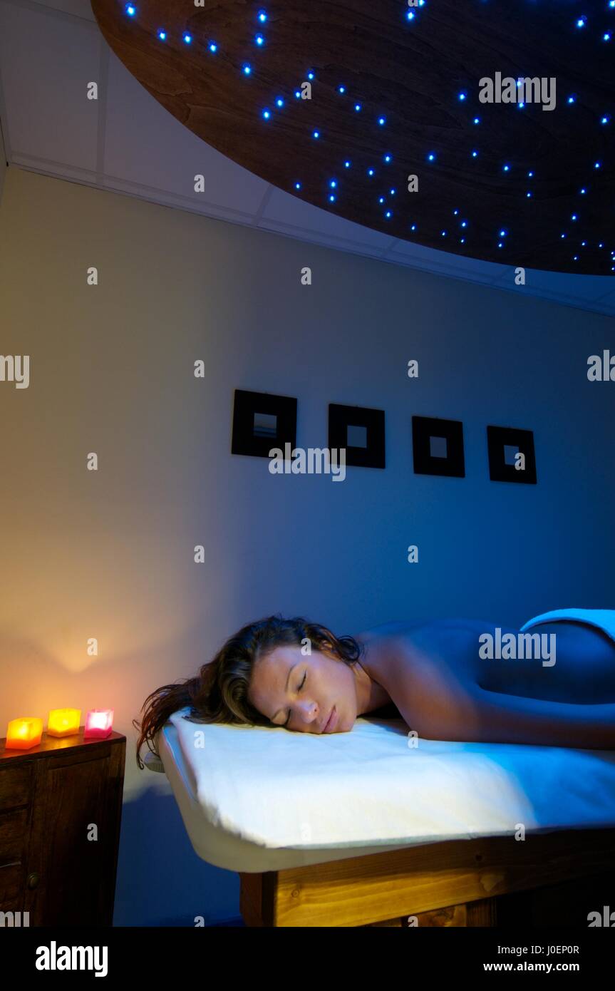 woman doing color therapy chromotherapy in spa room Stock Photo - Alamy