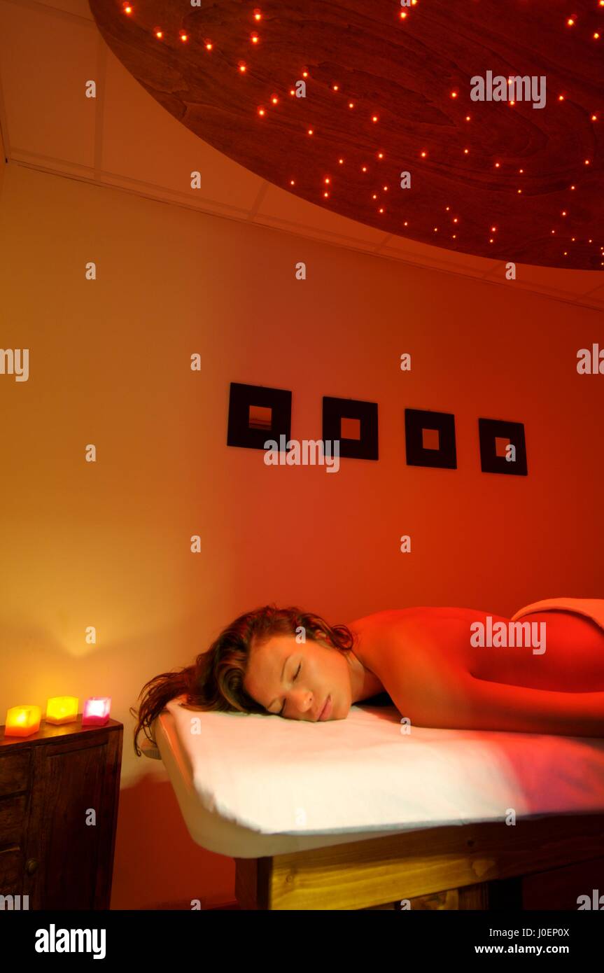woman doing color therapy chromotherapy in spa room Stock Photo - Alamy