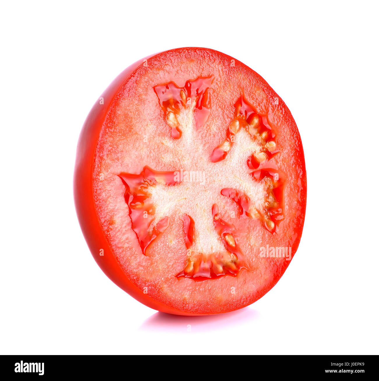 Slice tomato isolated on the white background Stock Photo - Alamy