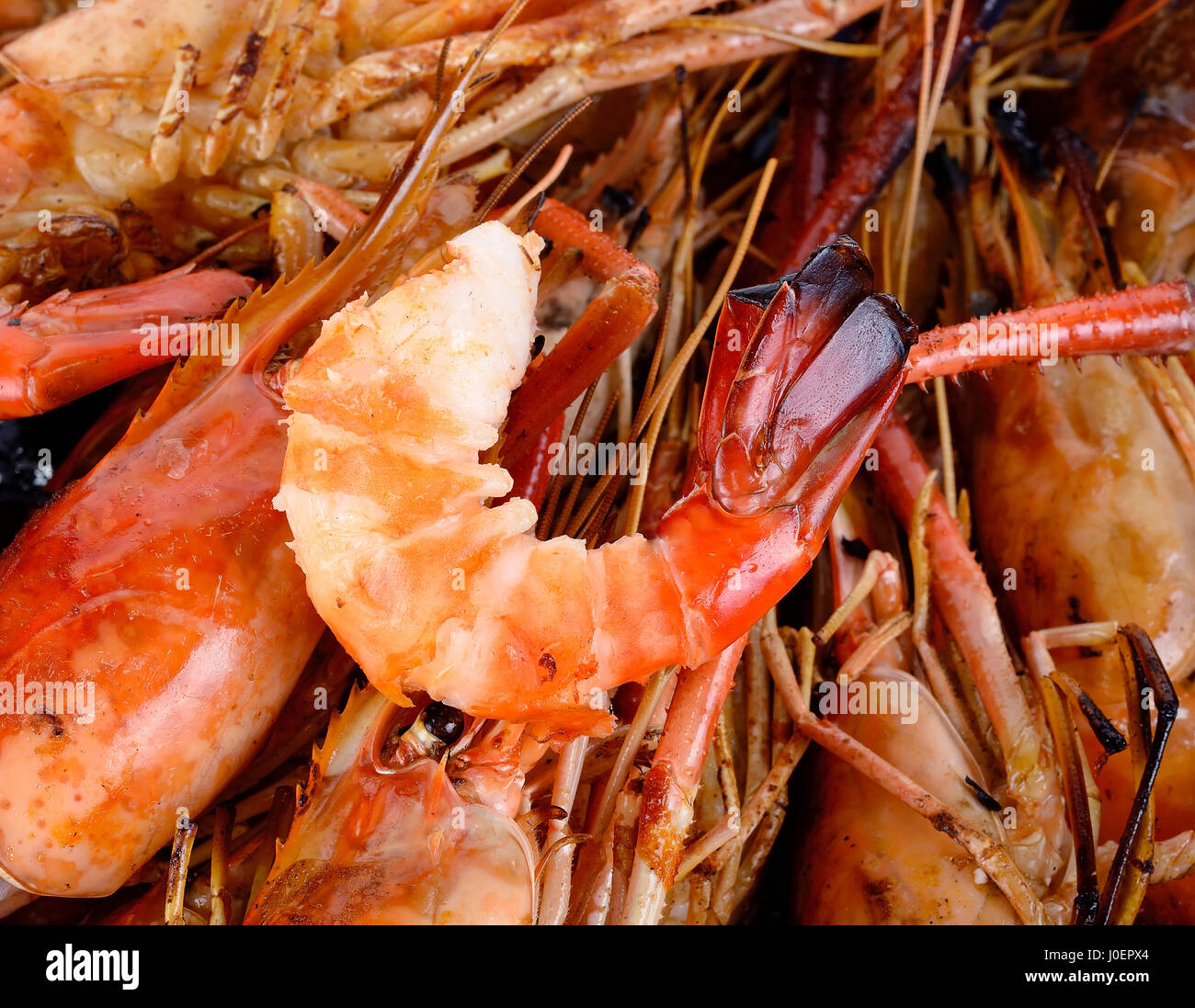 Close up Grilled shrimp with flames Stock Photo - Alamy