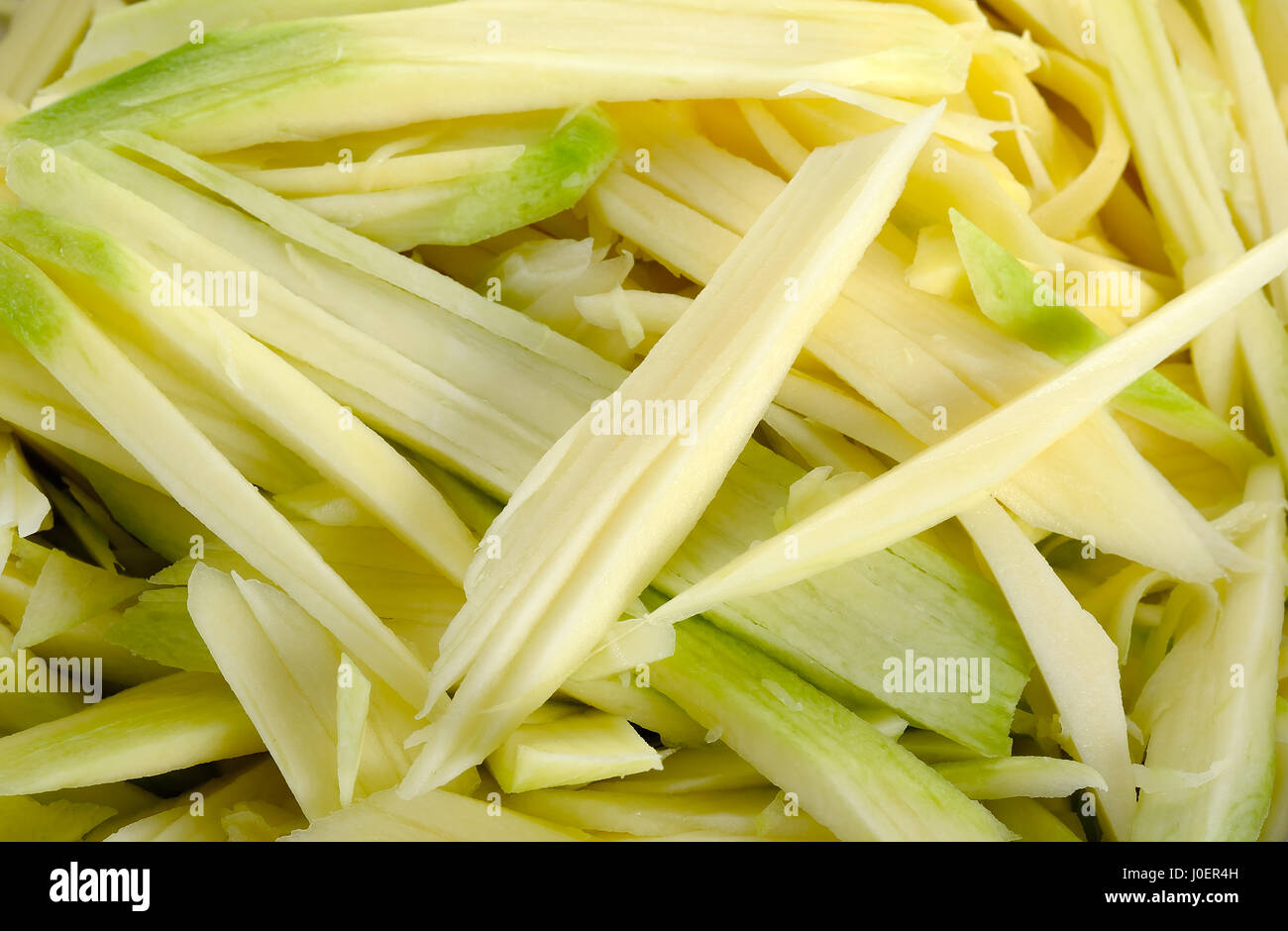 Close up chopped green mango background Stock Photo - Alamy