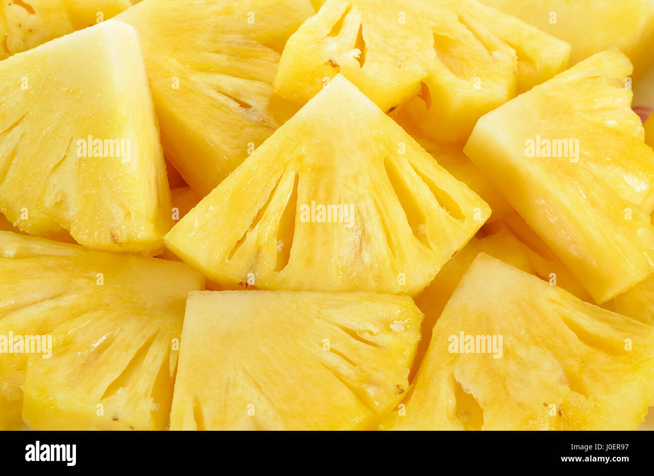 Close up slice pineapple background texture Stock Photo - Alamy