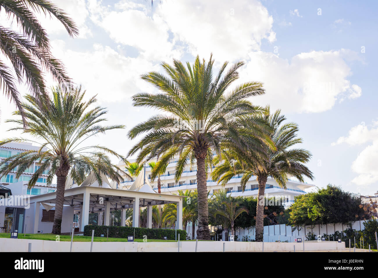 Front view of a hotel in evening sun Stock Photo - Alamy