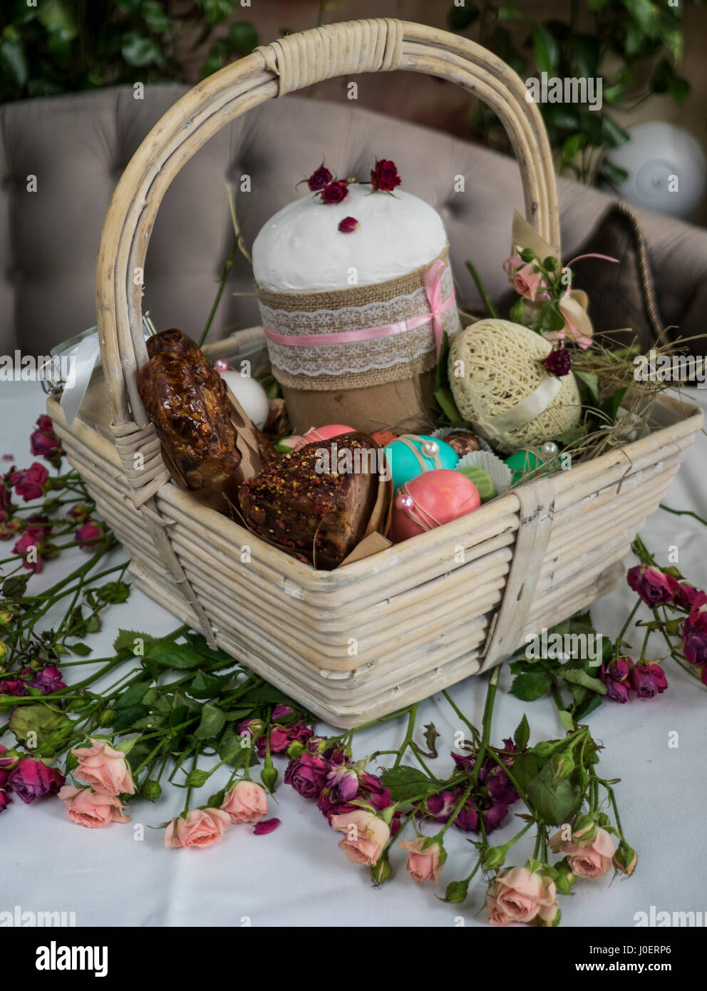 Easter basket for ceremony witn different food: Easter cake, colored ...