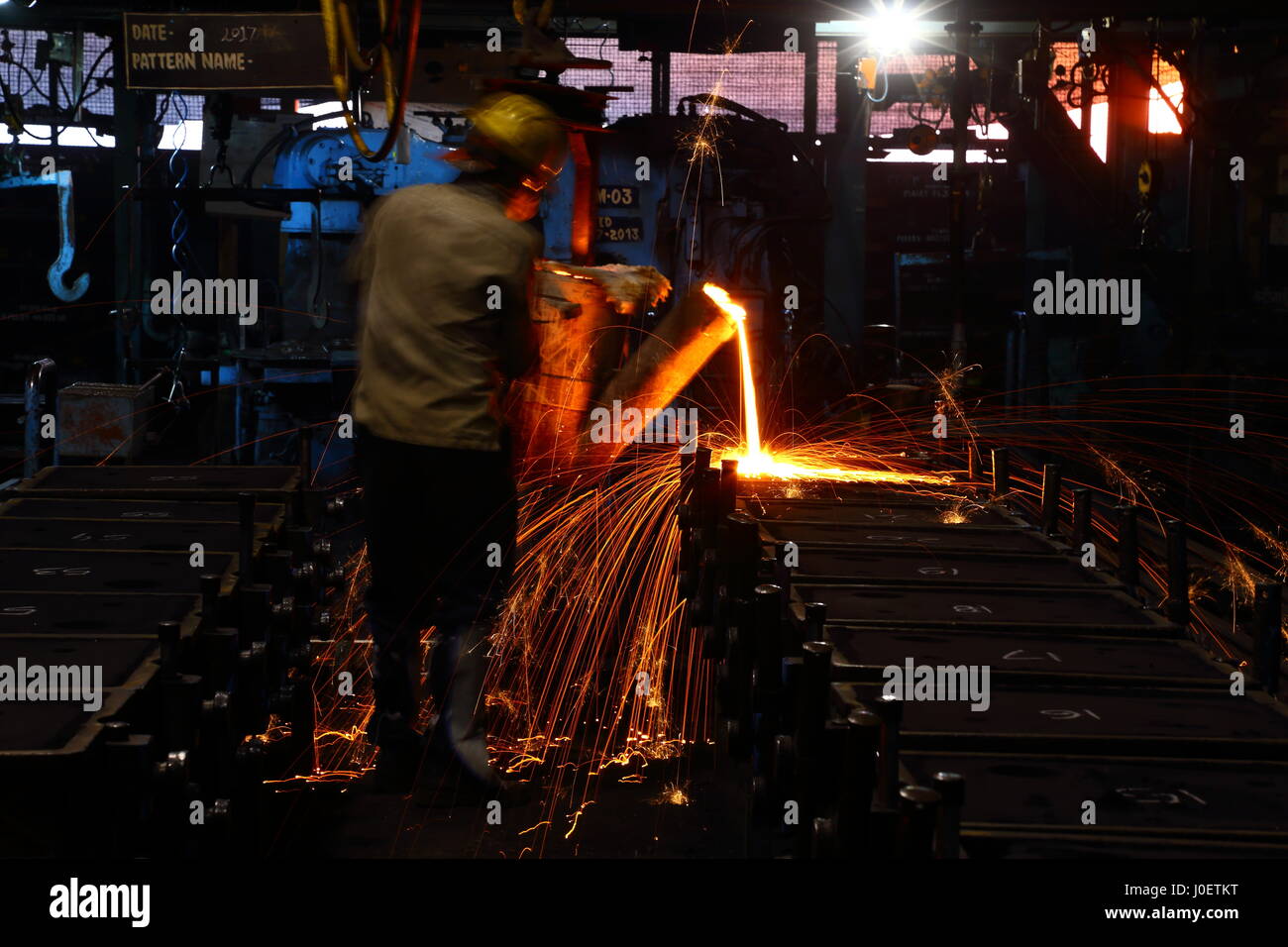 Pouring liquid metal casting hi-res stock photography and images - Alamy