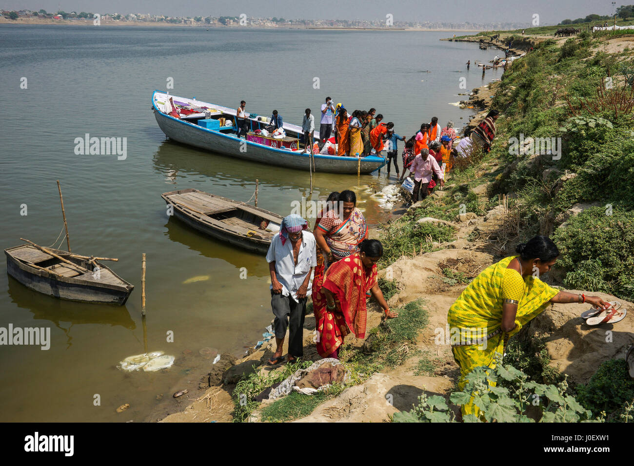 Pilgrims crossing river ganga hi-res stock photography and images - Alamy
