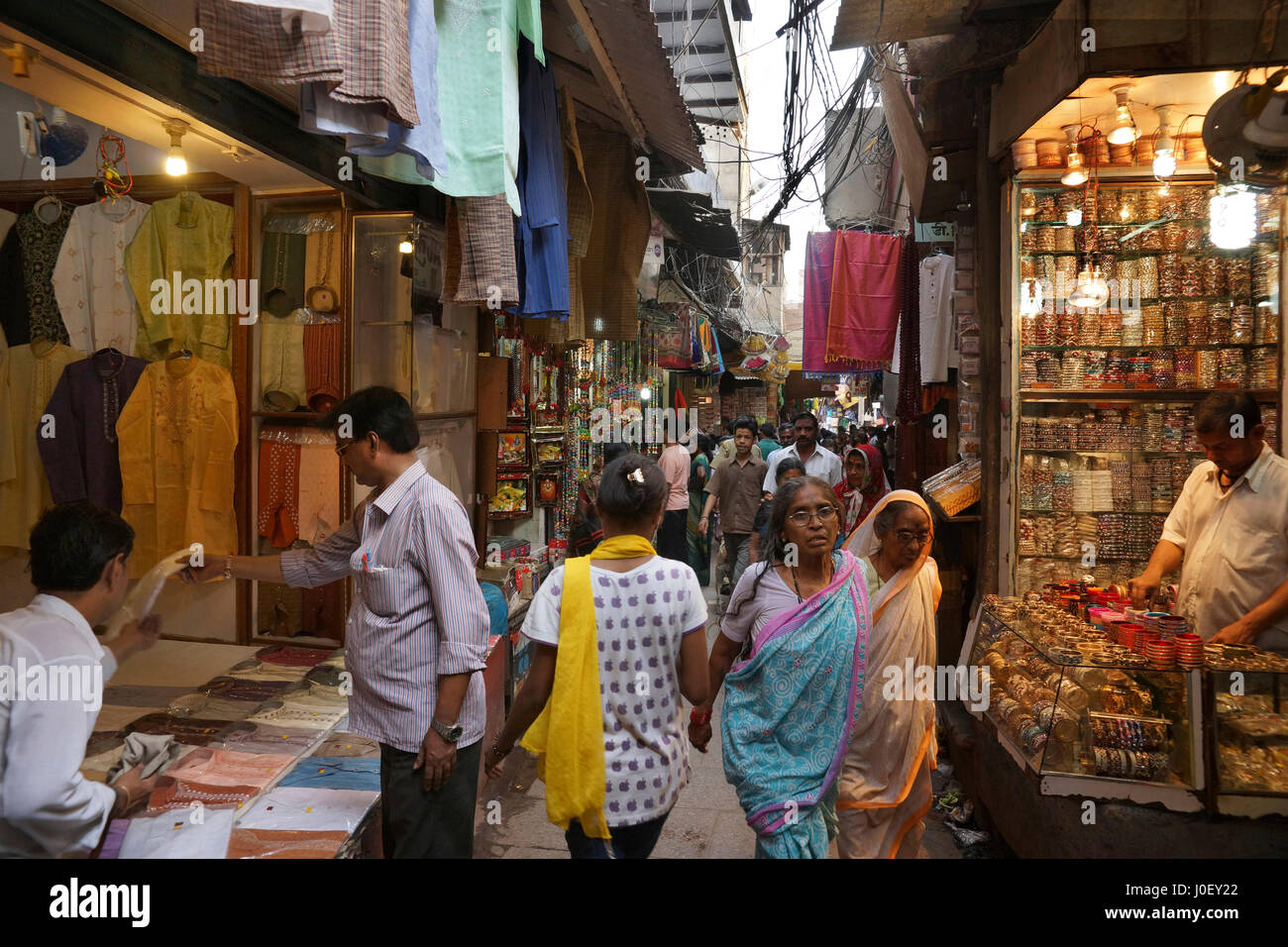 Tourists shopping in narrow lanes, varanasi, uttar pradesh, india, asia ...