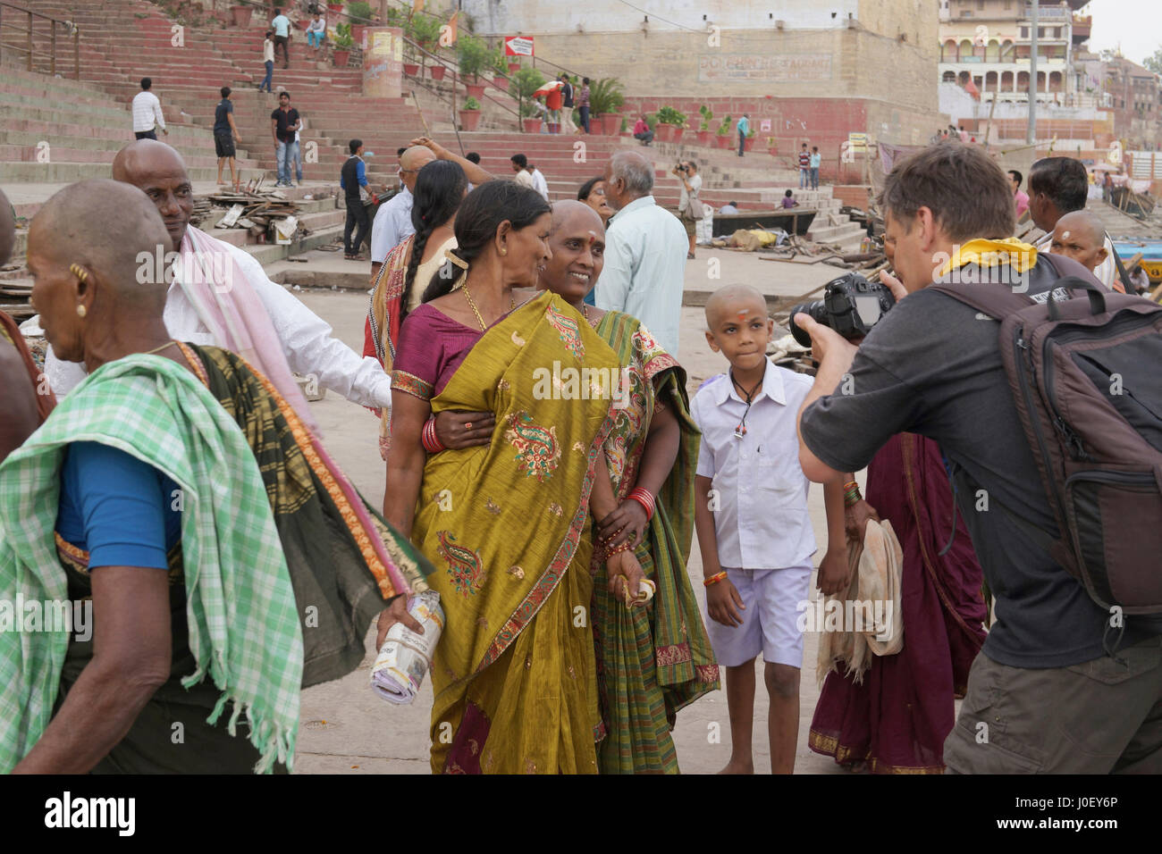 Pilgrims posing for a foreign photographer, varanasi, uttar pradesh ...