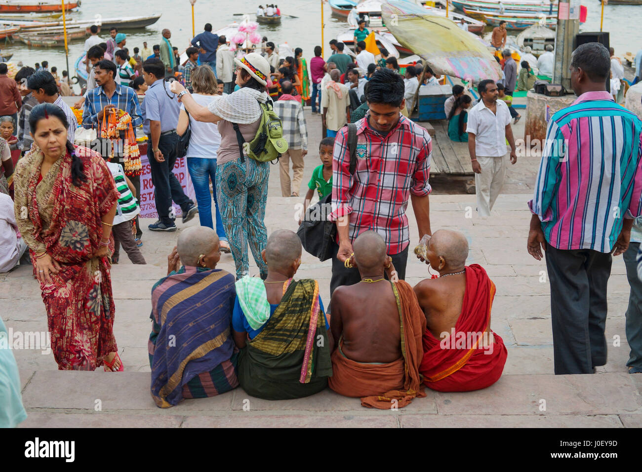 Pilgrims sitting on ghat, varanasi, uttar pradesh, india, asia Stock ...