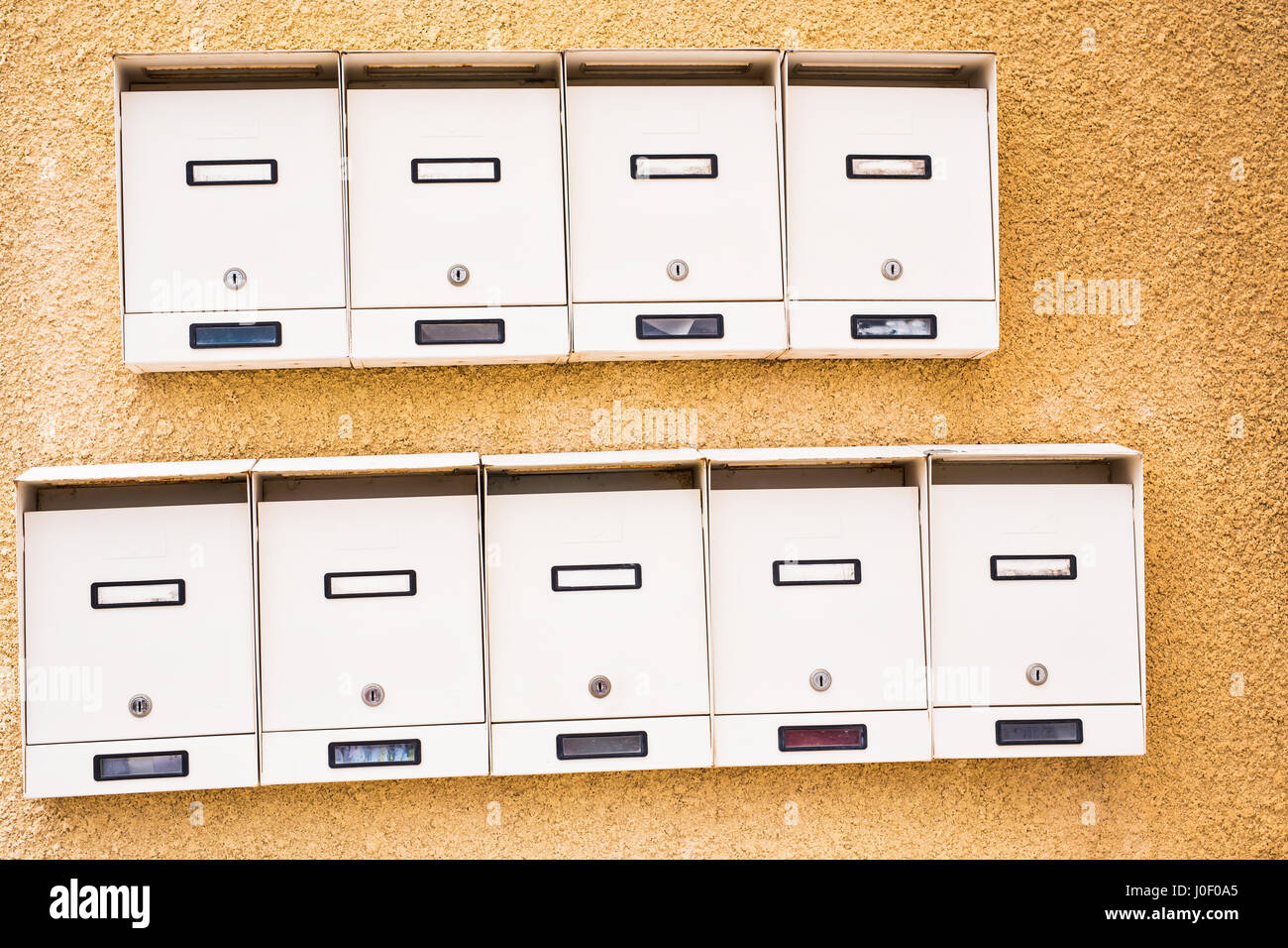 row of white mailboxs Stock Photo - Alamy