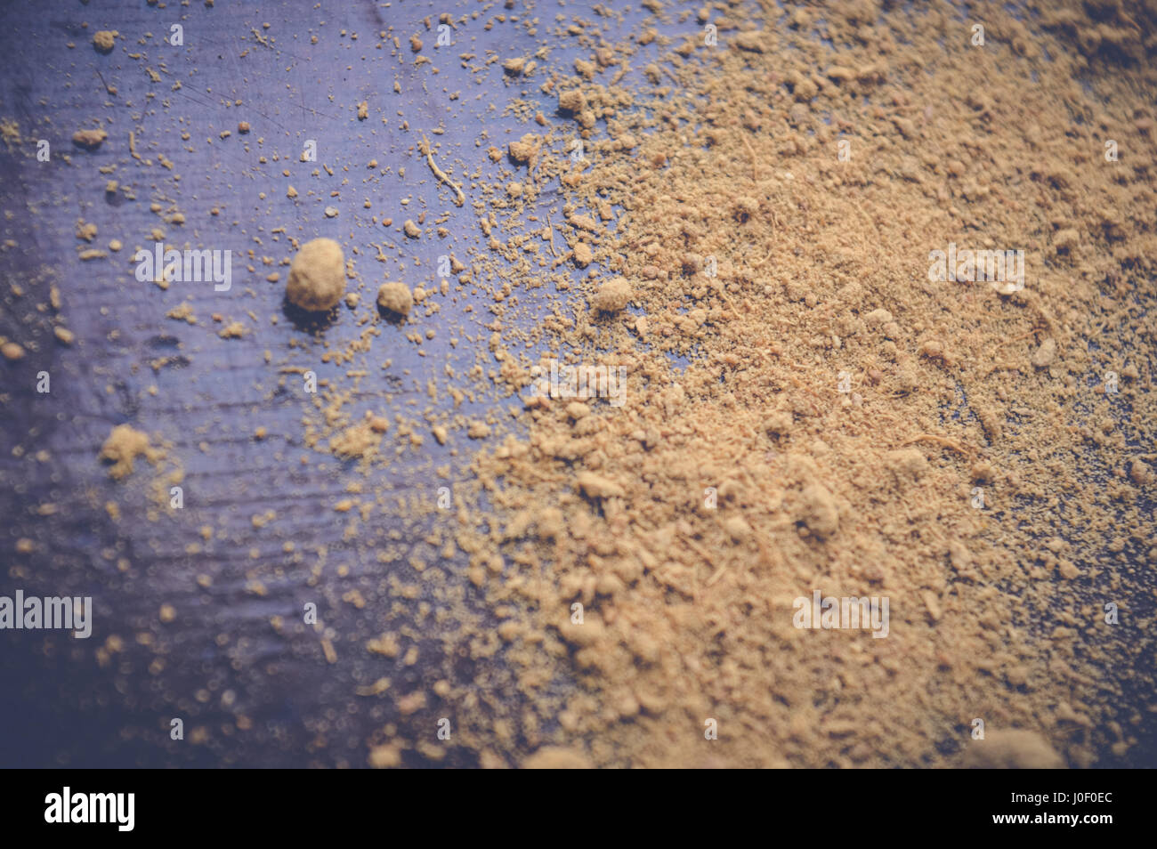 ginger poweder on wooden table background texture Stock Photo - Alamy