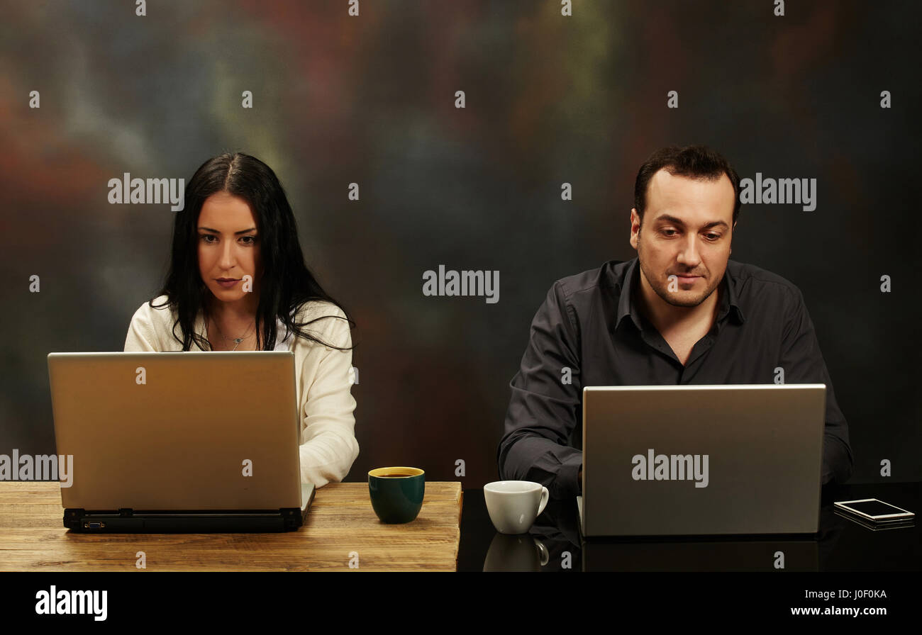 Man woman work on laptops hi-res stock photography and images - Alamy