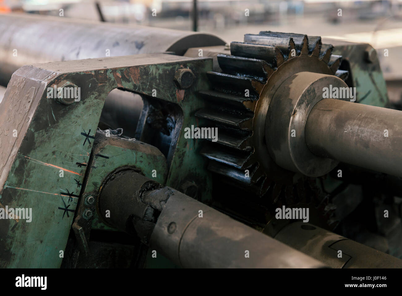 large metal gear on a massive machine for bending metal Stock Photo - Alamy